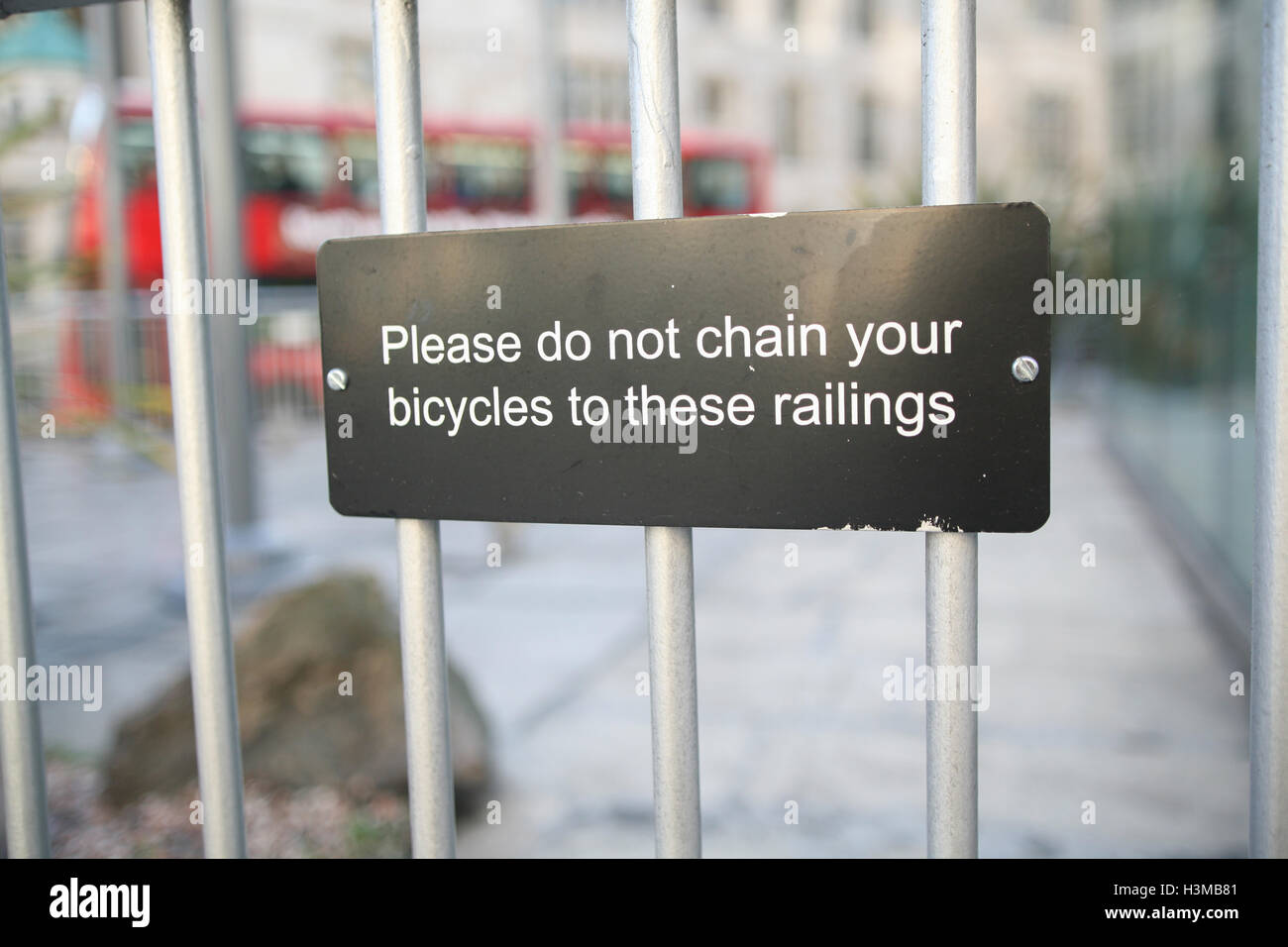 Do not chain your bicycle to these railings sign in Westminster. Sunny ...