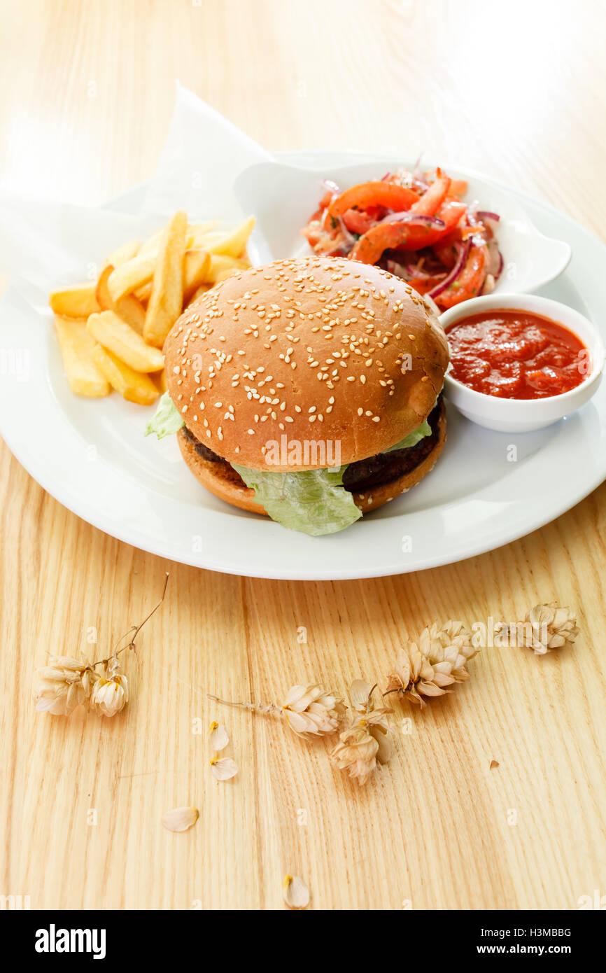 burger on plate Stock Photo - Alamy