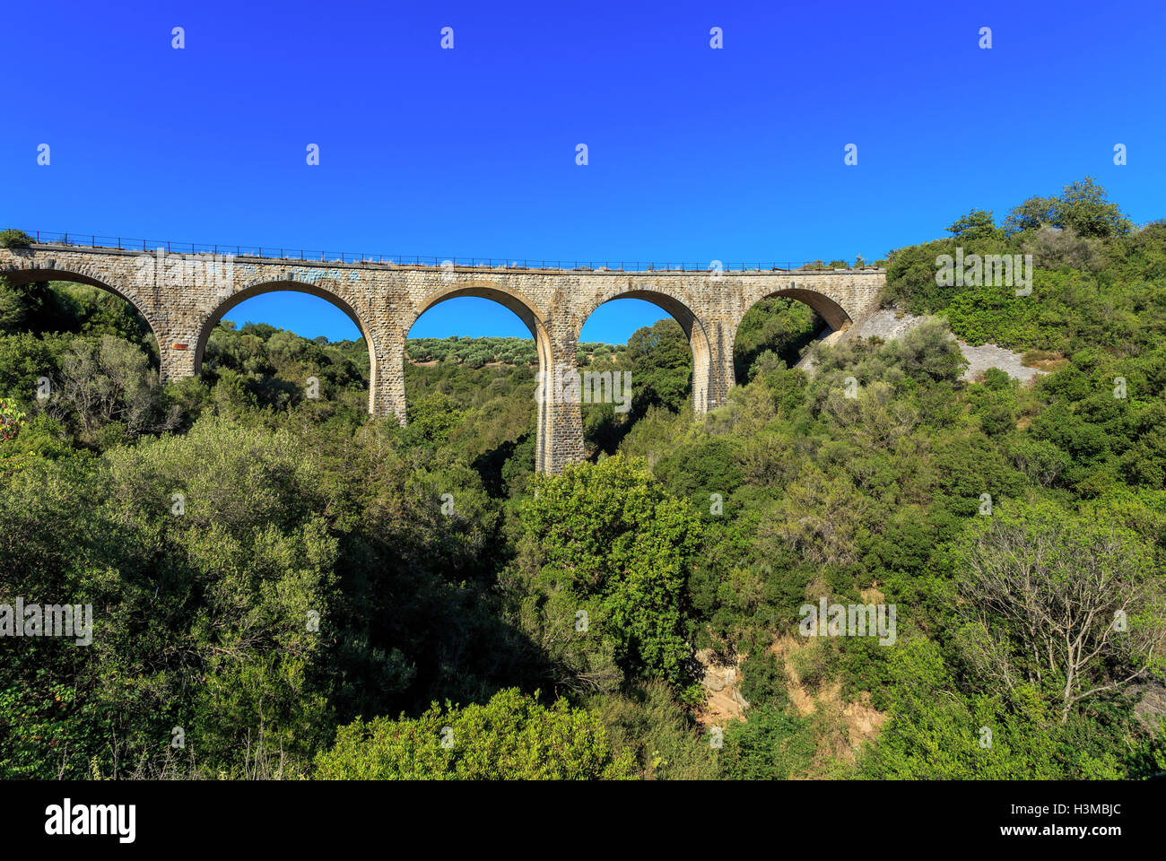old railroad arch bridge on Peloponnese, Greece Stock Photo - Alamy