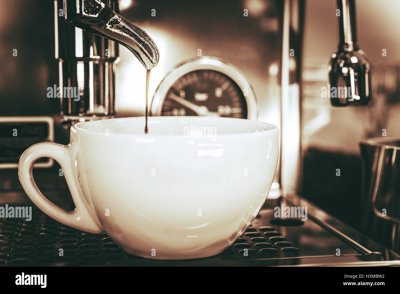Cappuccino in the Making. Coffee Cup Under Coffee Machine Portafilter ...