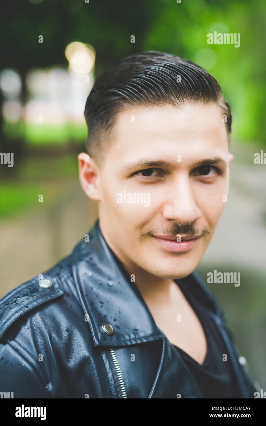 Young man with toothbrush moustache Stock Photo - Alamy