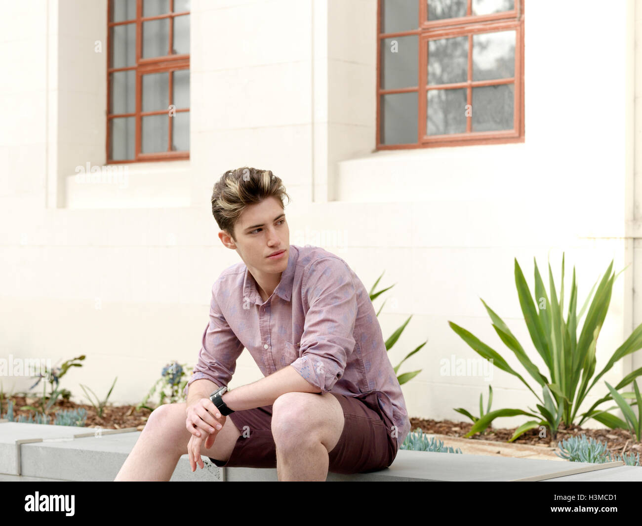 Man sitting step hi-res stock photography and images - Alamy