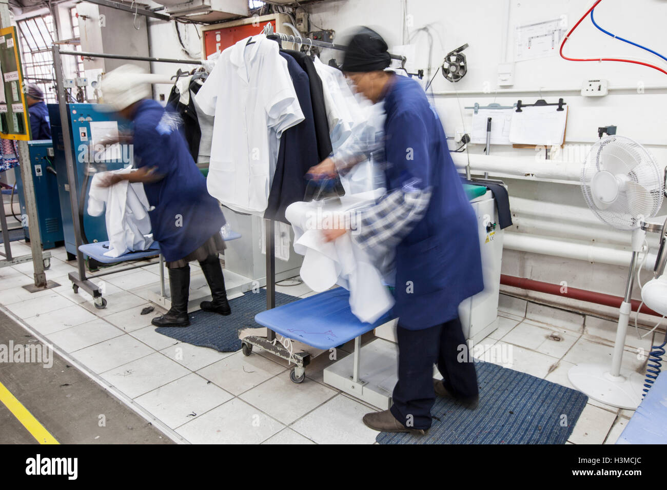 Ironing white shirt hi-res stock photography and images - Alamy