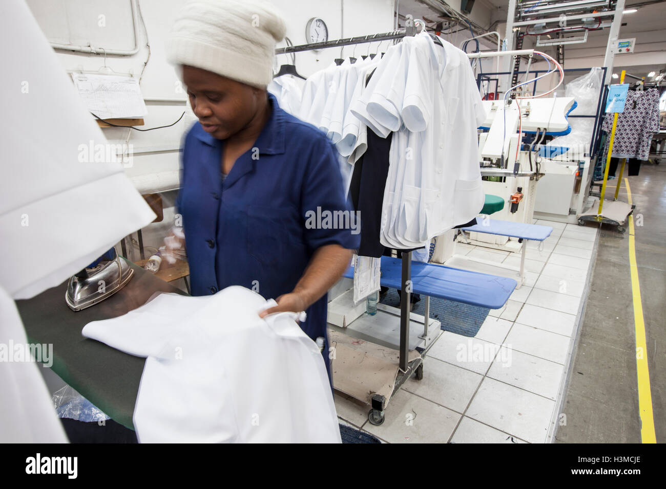 Factory worker in white uniform hi-res stock photography and images - Alamy