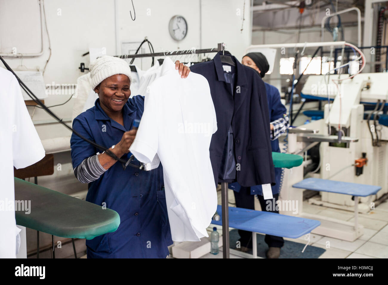 Ironing white shirt hi-res stock photography and images - Alamy