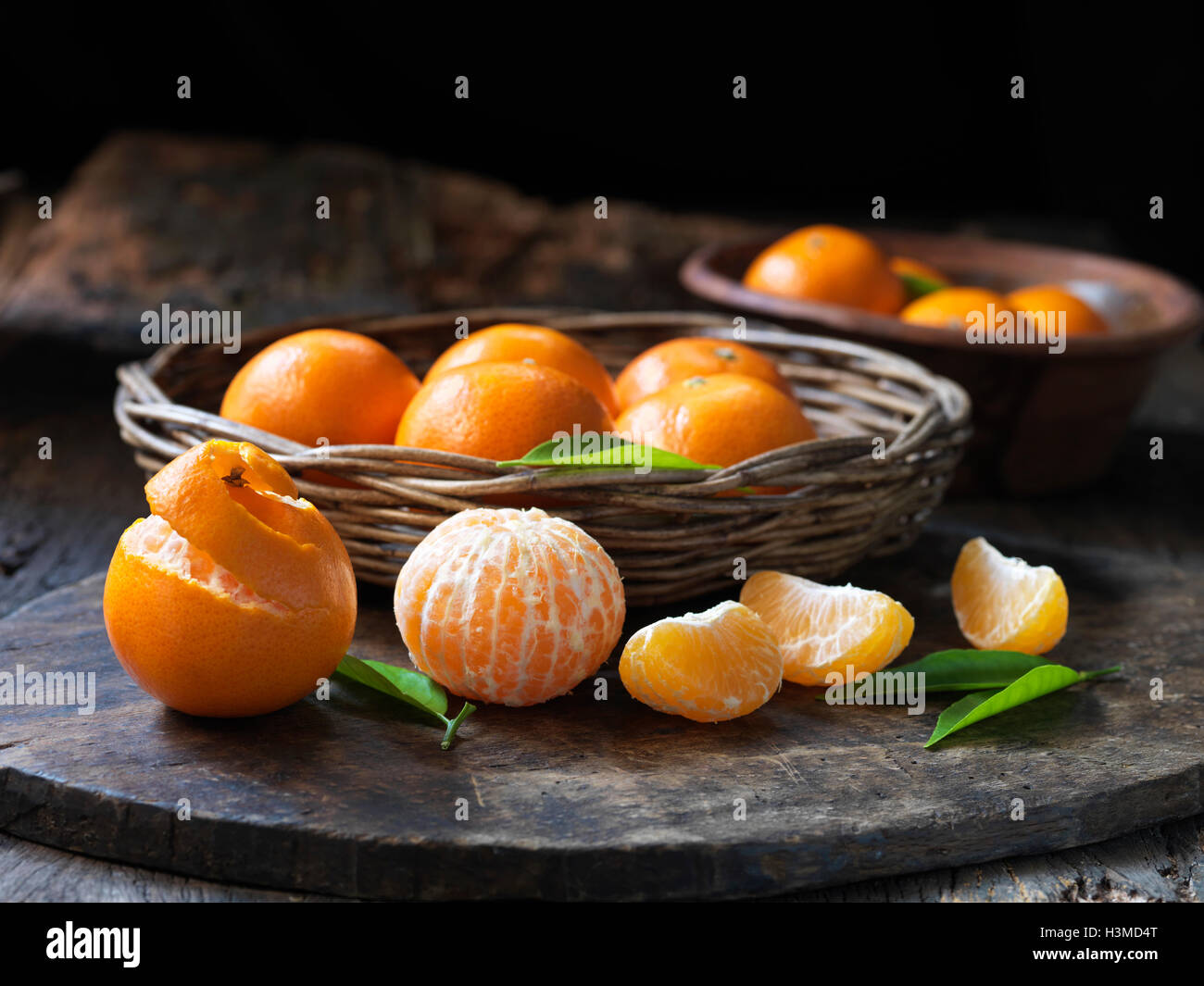 Fresh organic fruit, seedless tangerines with leaves Stock Photo - Alamy