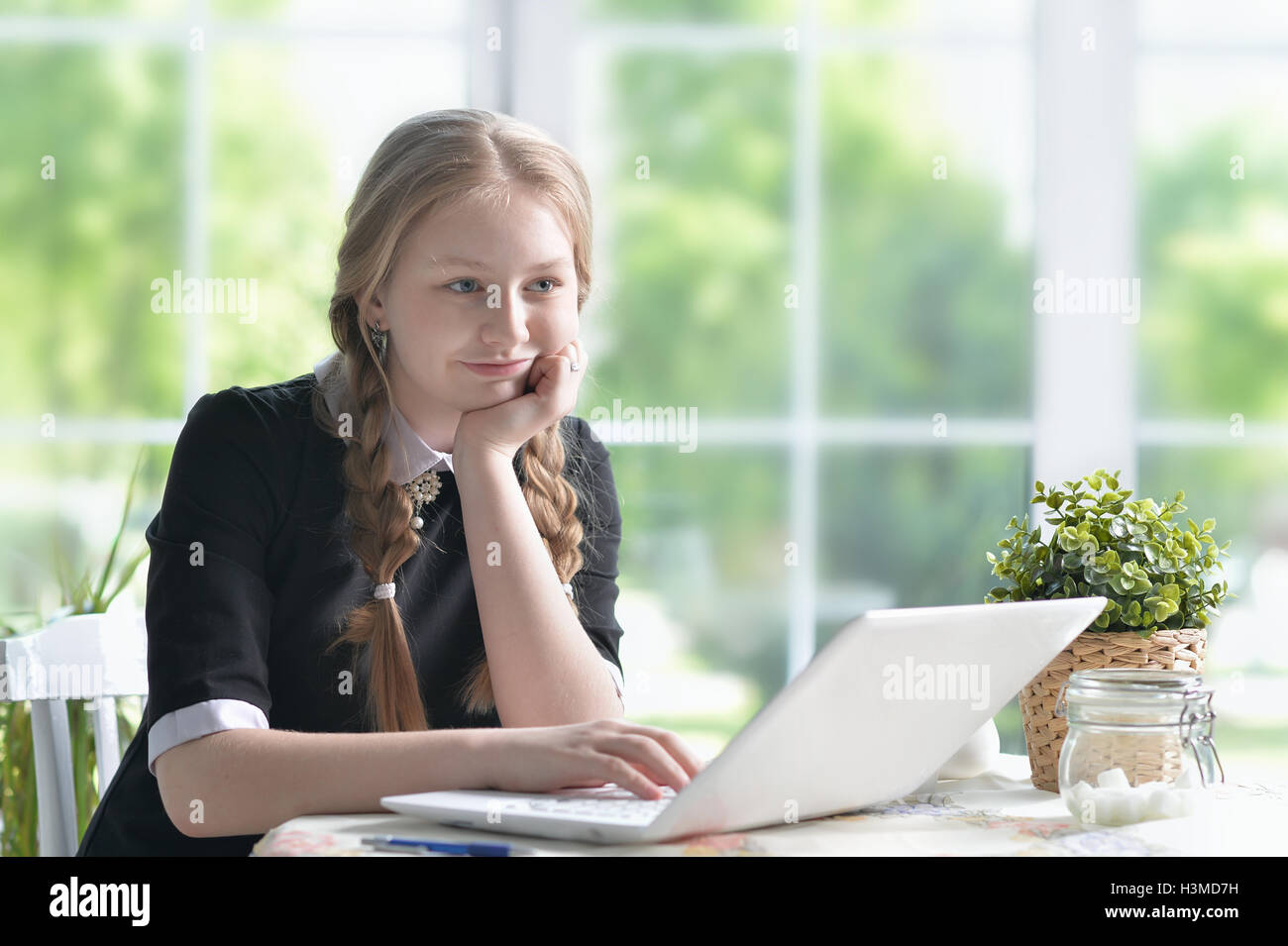 happy girl using laptop Stock Photo - Alamy