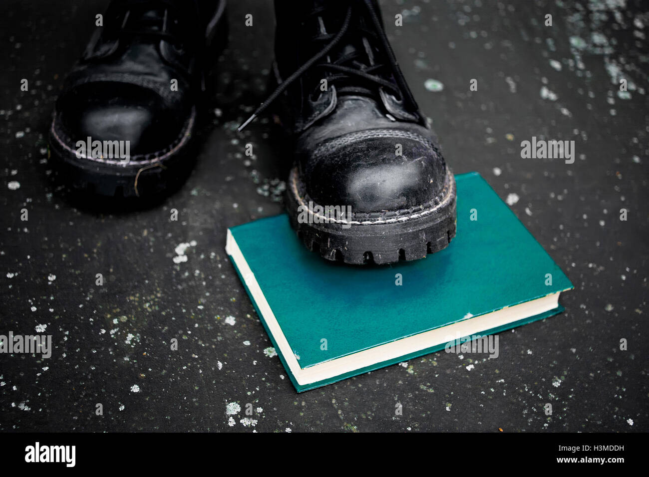 Foot On A Book Stock Photo - Alamy