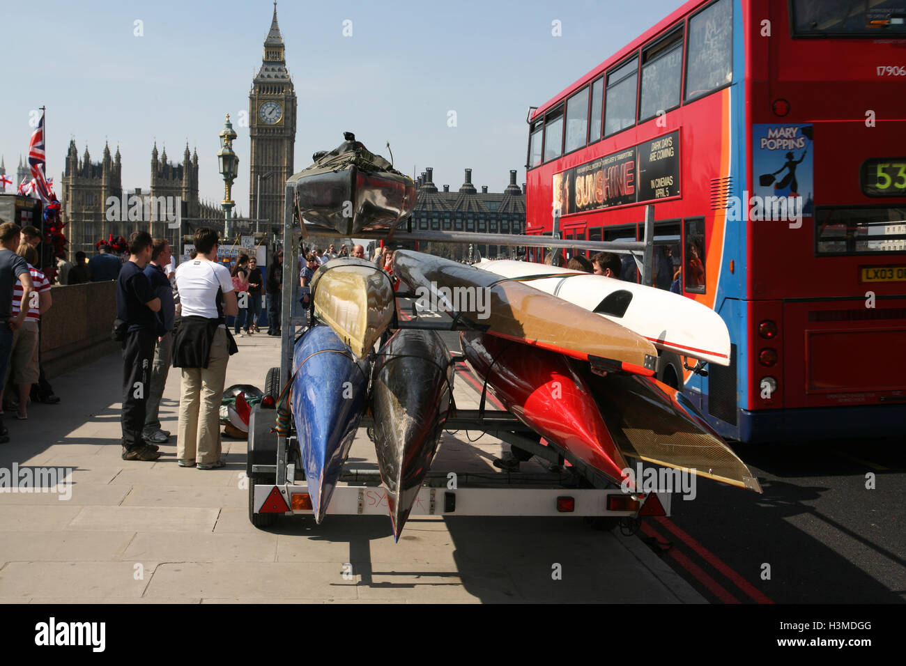 After the race is over support crews load the canoes for the journey ...