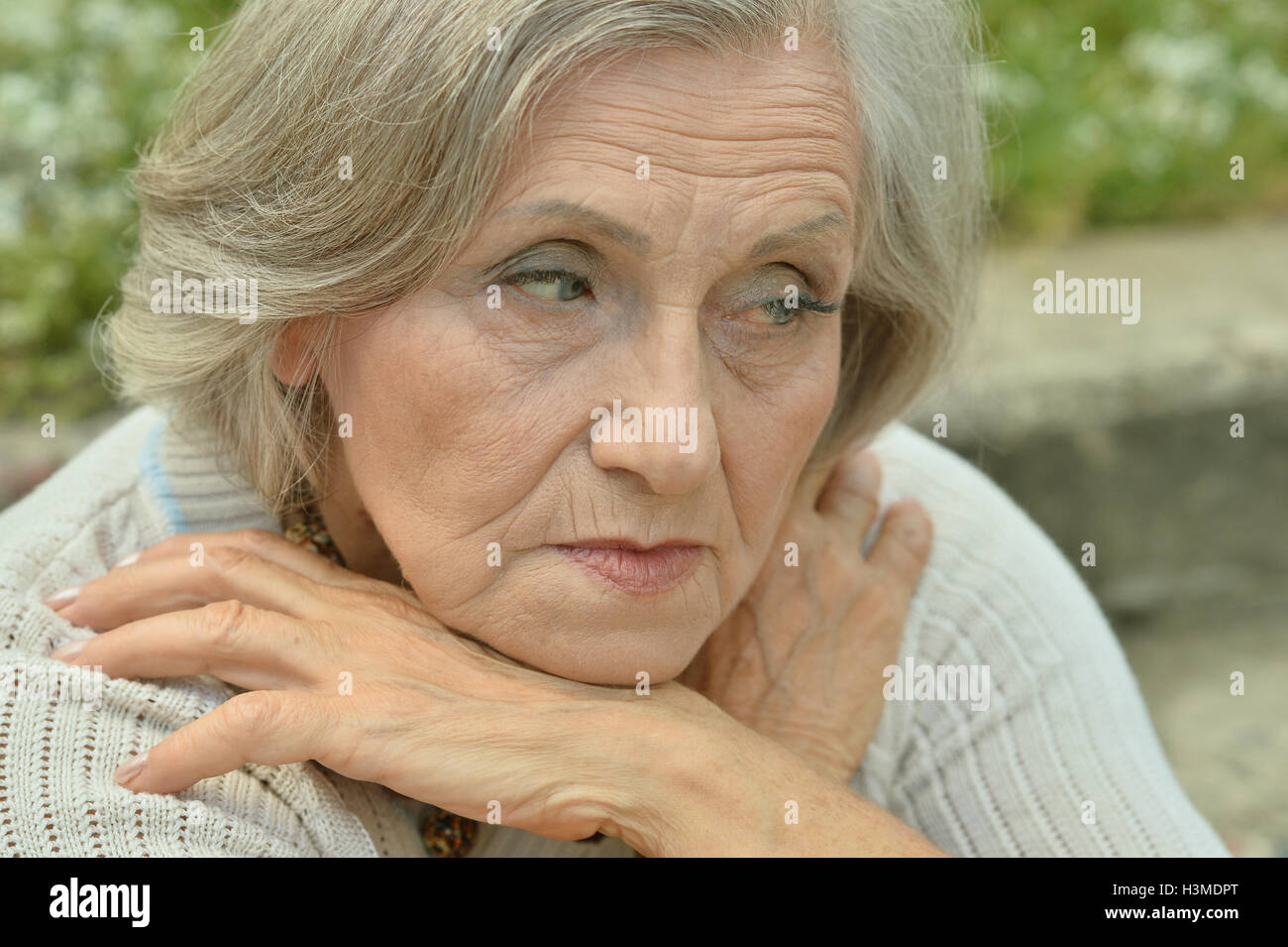 Nice sad old woman Stock Photo - Alamy