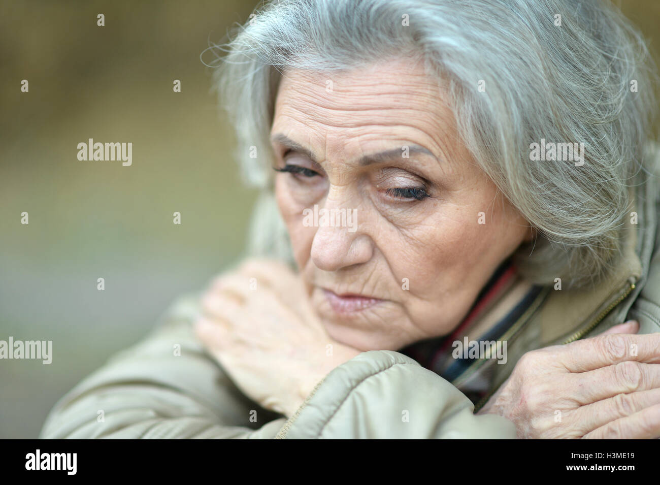 Nice sad old woman Stock Photo - Alamy