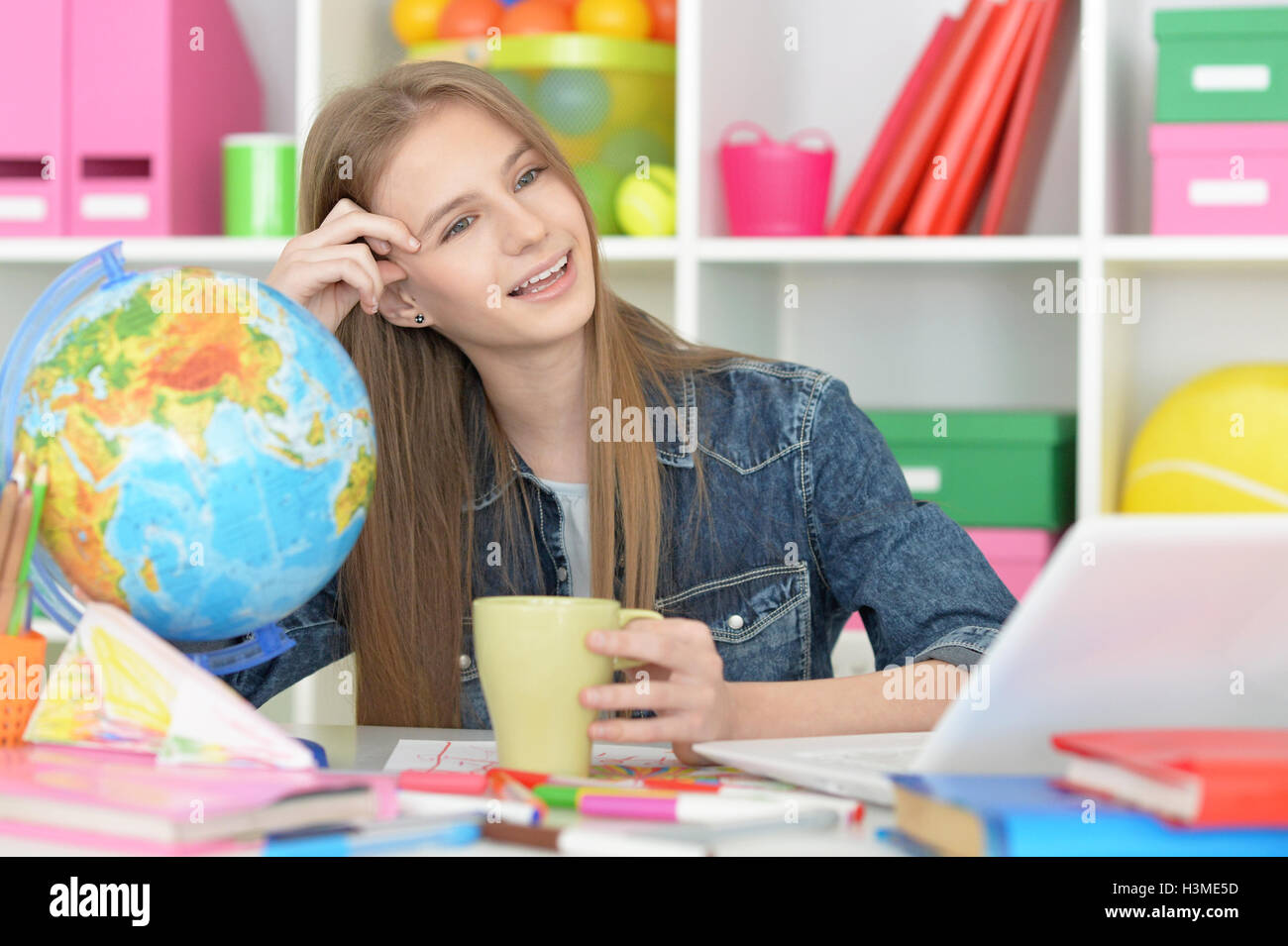 Cute student girl at class Stock Photo - Alamy