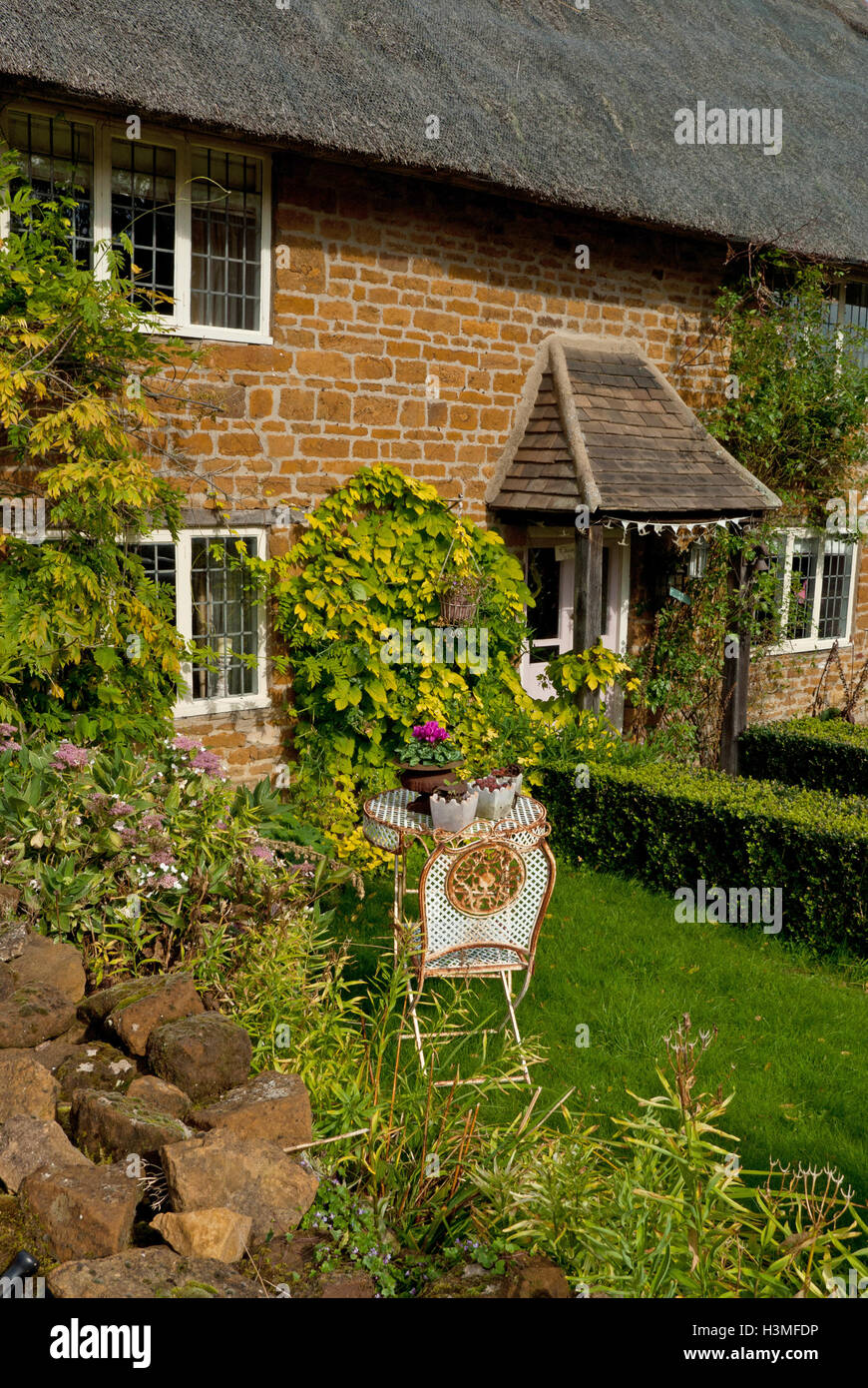 Pretty detached thatched cottage in the village of Nevill Holt ...