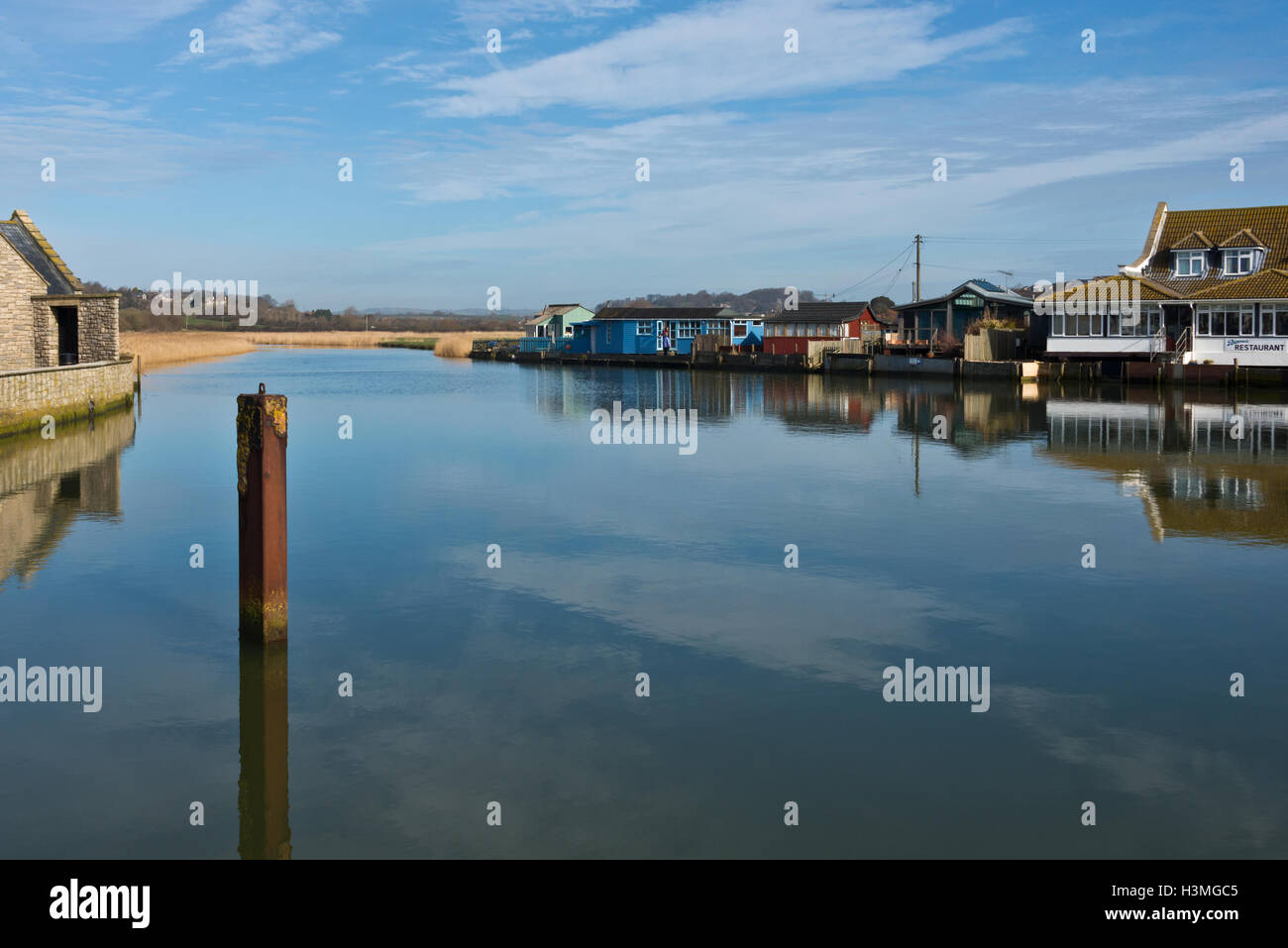 A view back up the still waters of the River Brit estuary from the ...