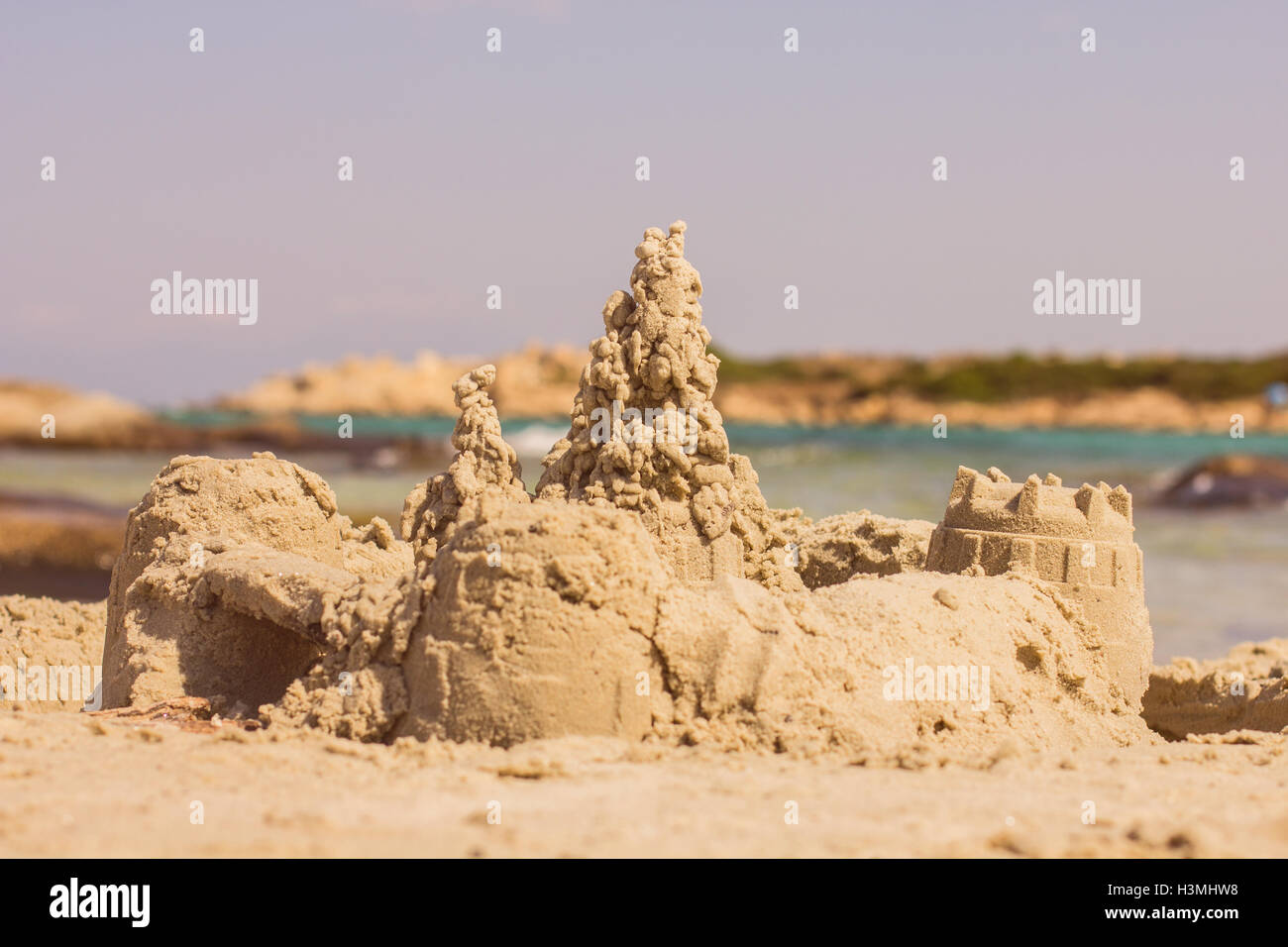 Sand castle on the beach, summer vacation Stock Photo - Alamy