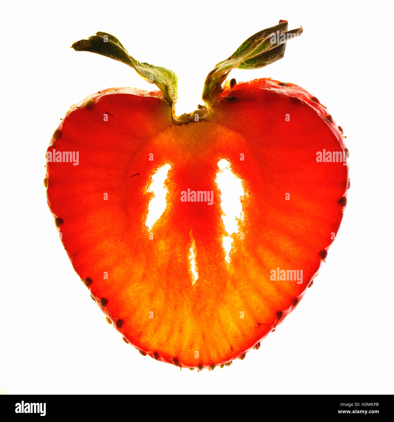 Close up of a juicy ripe strawberry slice hi-res stock photography and ...