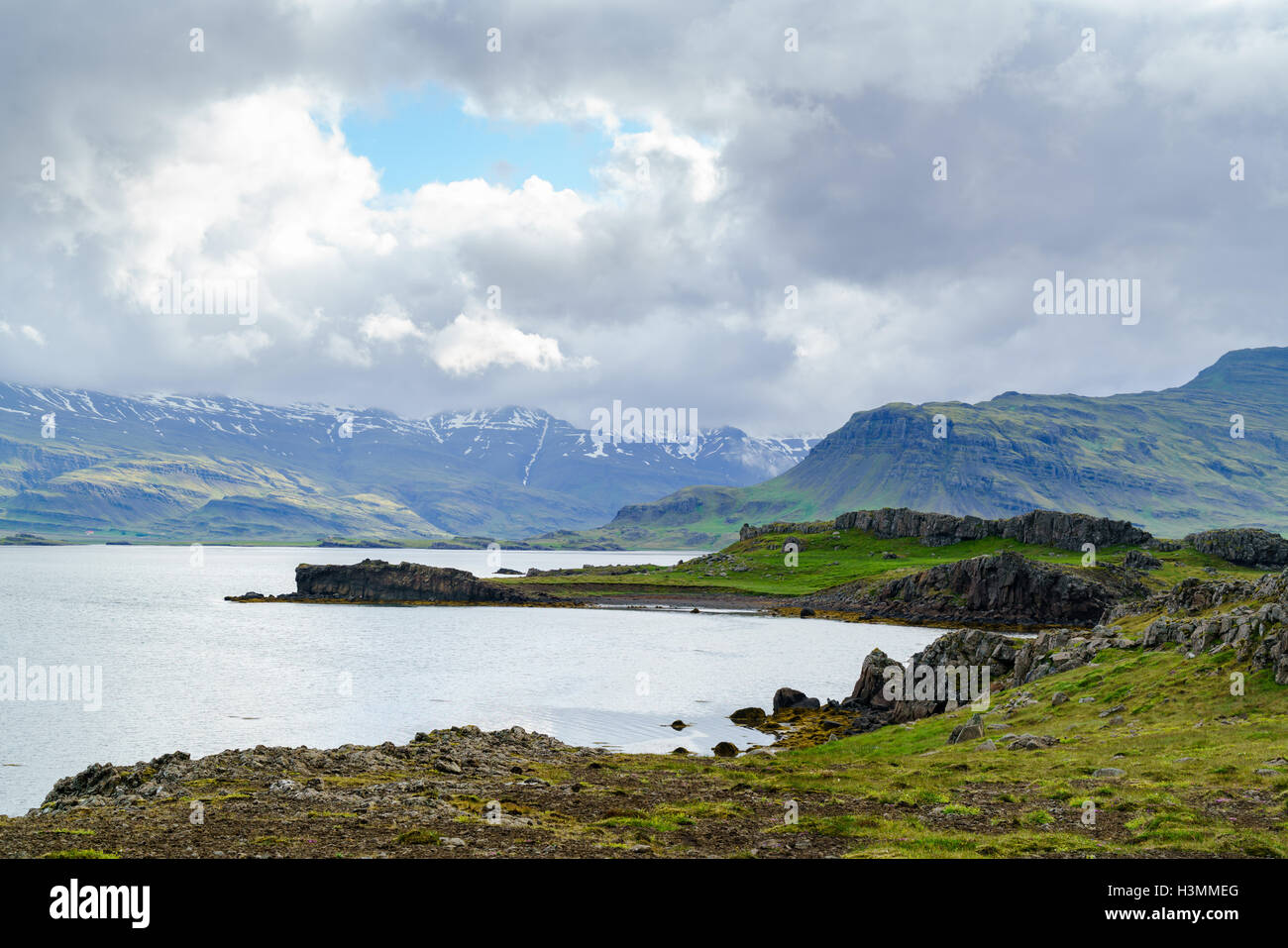 View of fjord and rain clouds in the north Iceland Stock Photo - Alamy