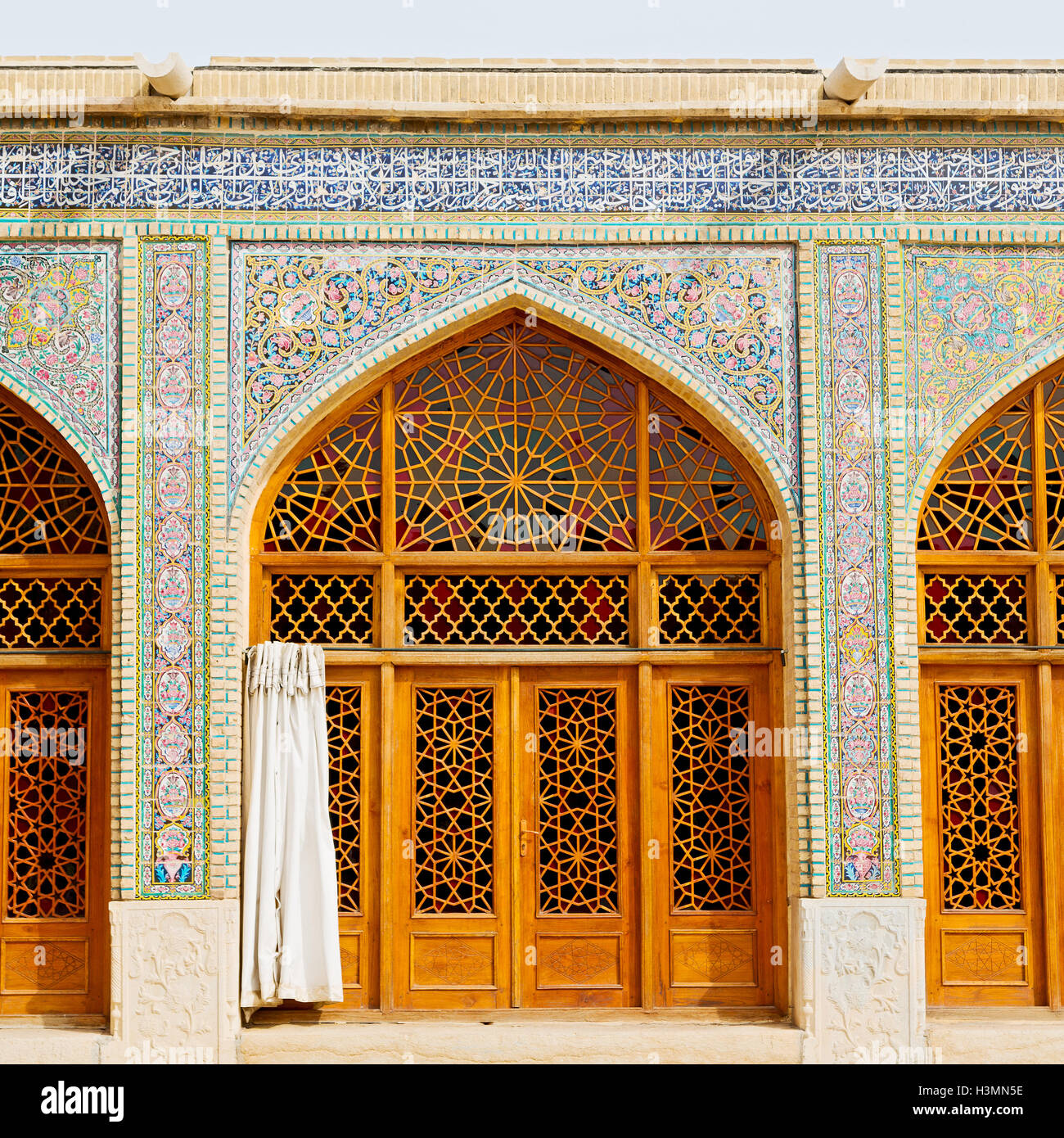 in iran the old mosque and traditional wall tile incision near minaret ...