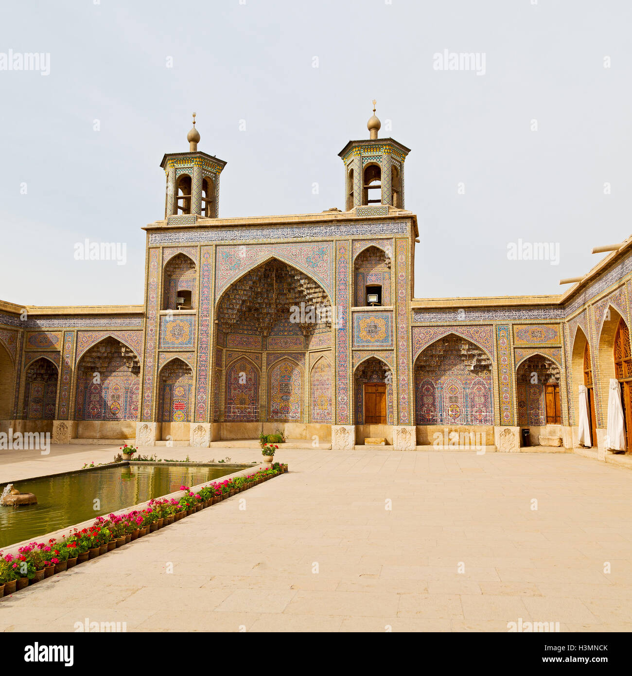in iran the old mosque and traditional wall tile incision near minaret ...