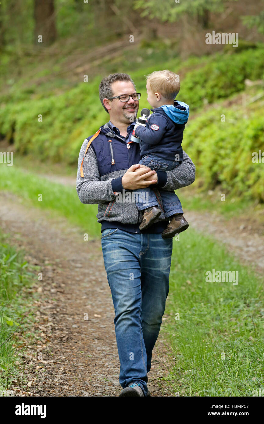 father carrying his little son Stock Photo - Alamy