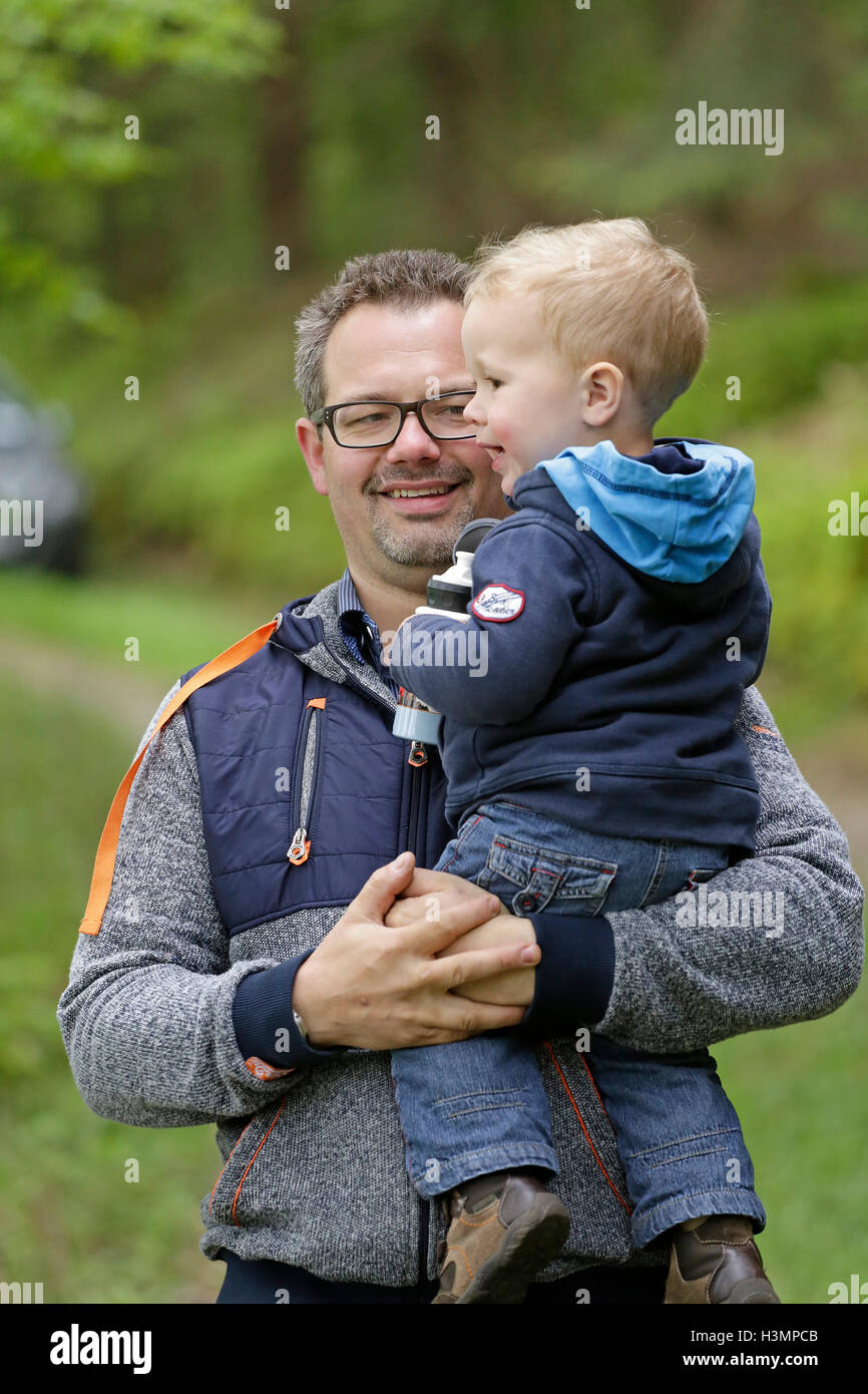 father carrying his little son Stock Photo - Alamy