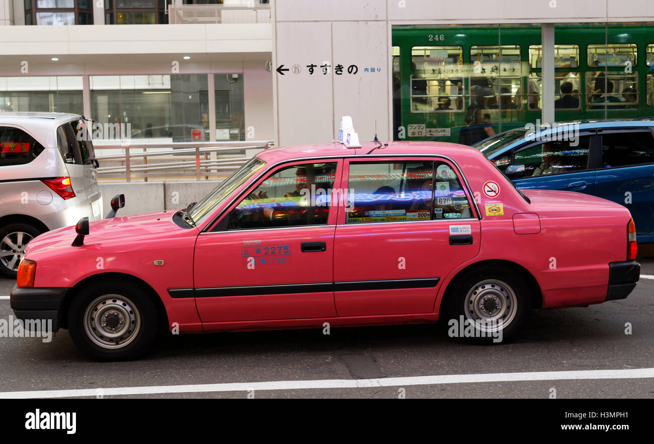 Sapporo Pink Taxi Stock Photo - Alamy