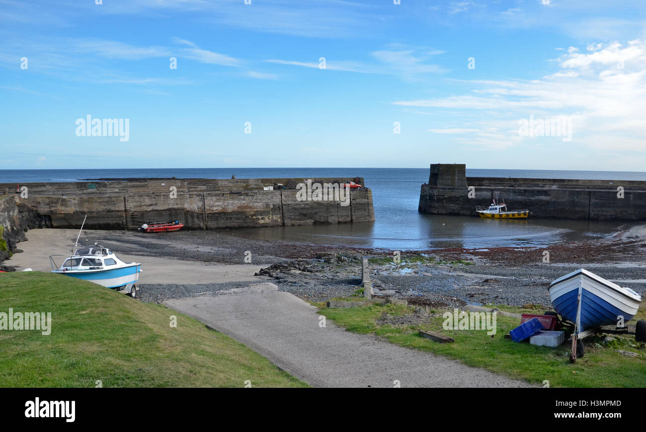 The harbour at the fishing village of Craster in Northumberland Stock ...
