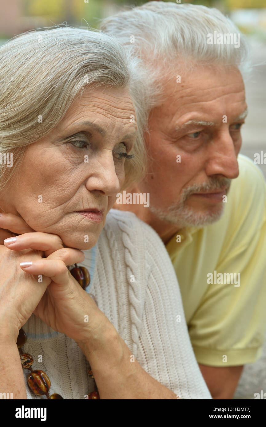 Sad senior couple Stock Photo - Alamy