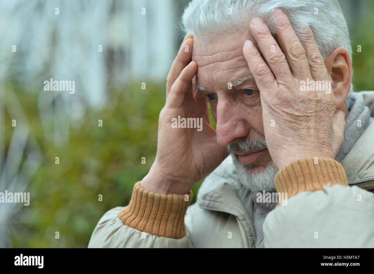 Senior man thinking Stock Photo - Alamy