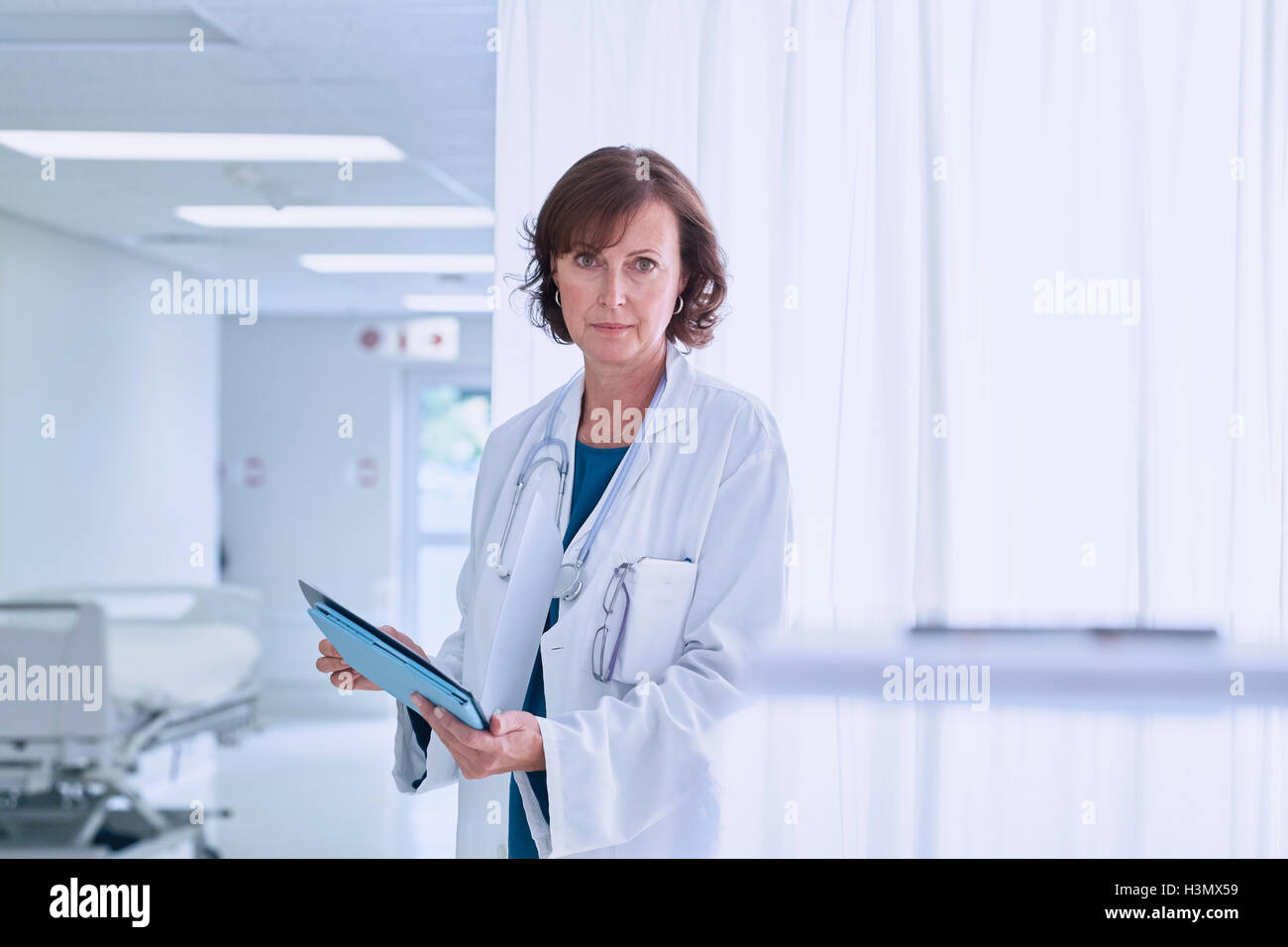Portrait of confident female doctor in hospital ward Stock Photo - Alamy