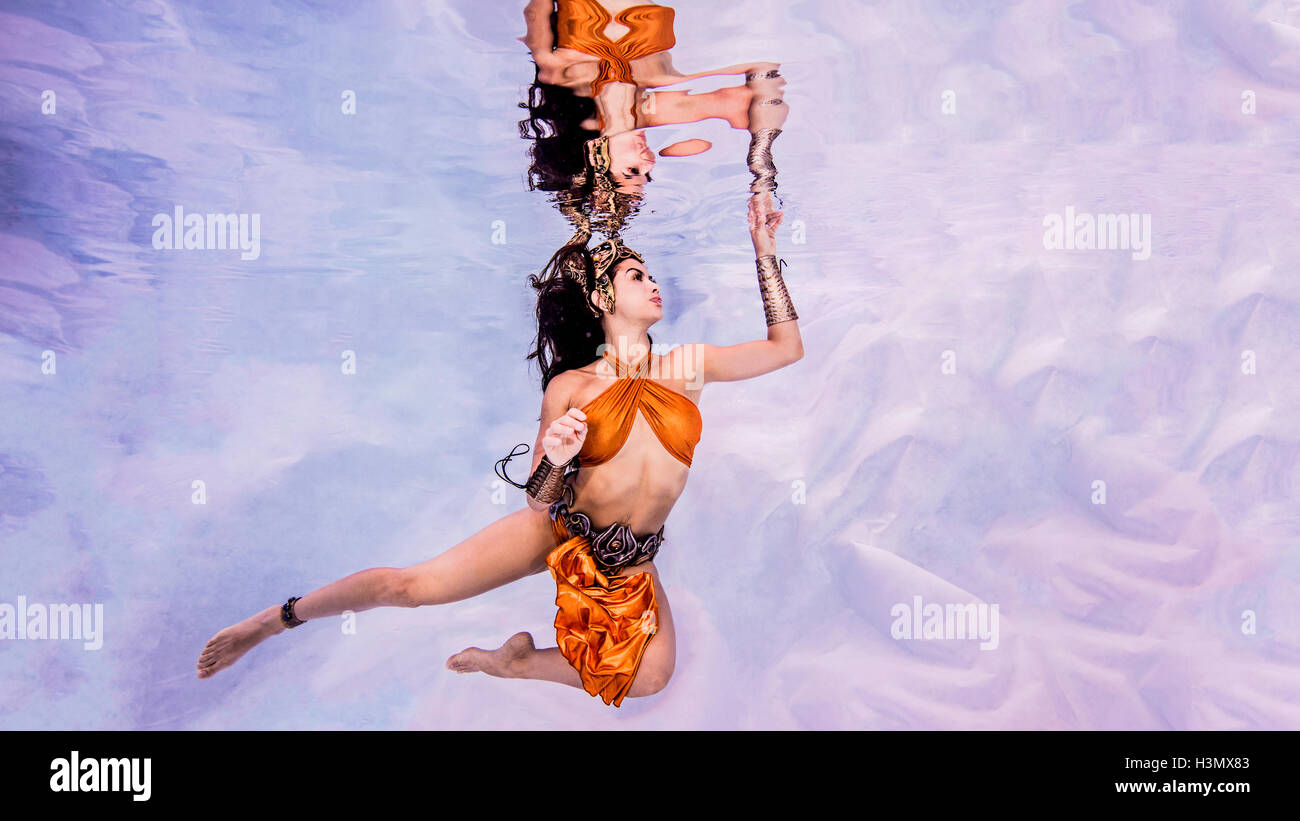 Woman underwater clothed hi-res stock photography and images - Alamy