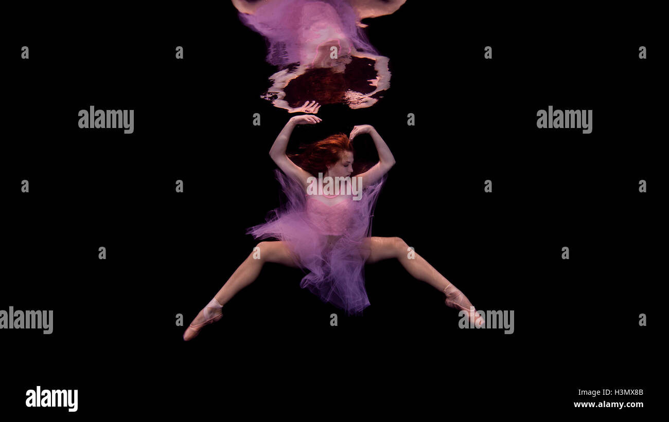Underwater view of girl wearing tutu and ballet shoes Stock Photo - Alamy