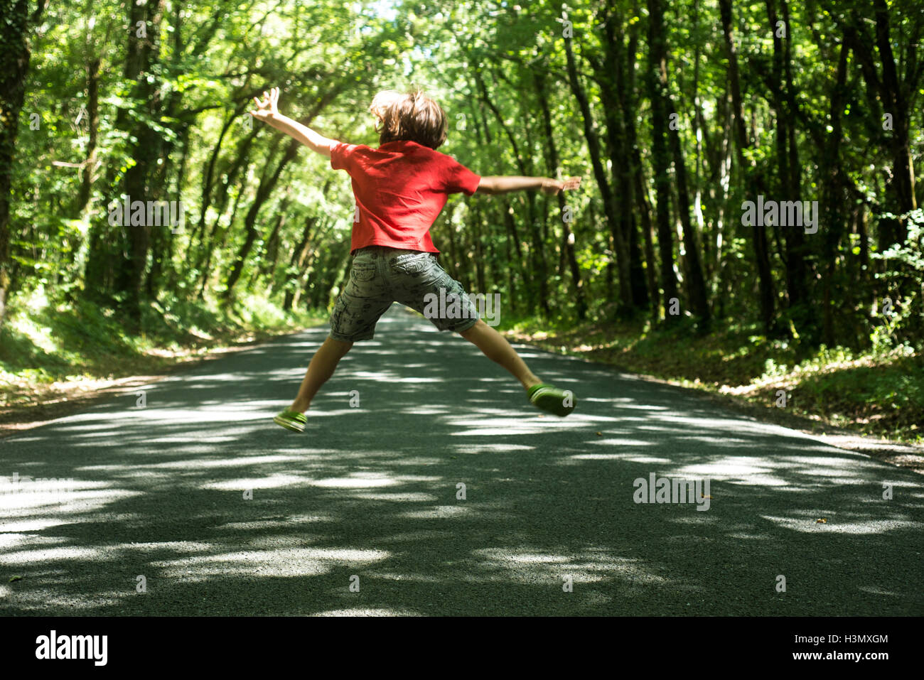 Child star jumping hi-res stock photography and images - Alamy