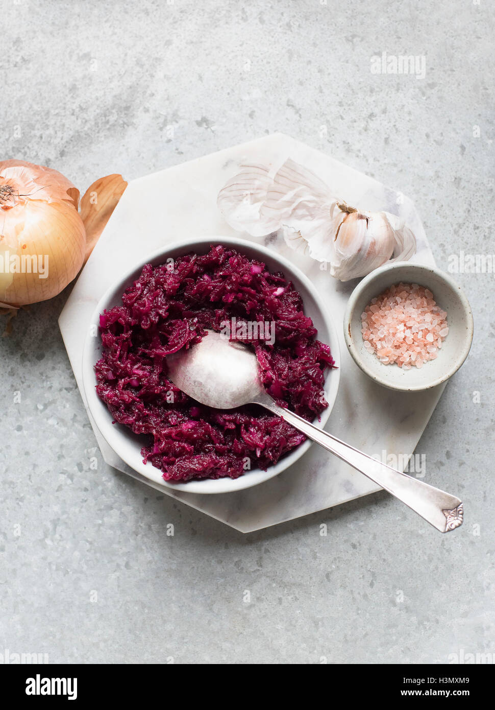 Grated beetroot with pink sea salt and garlic Stock Photo - Alamy