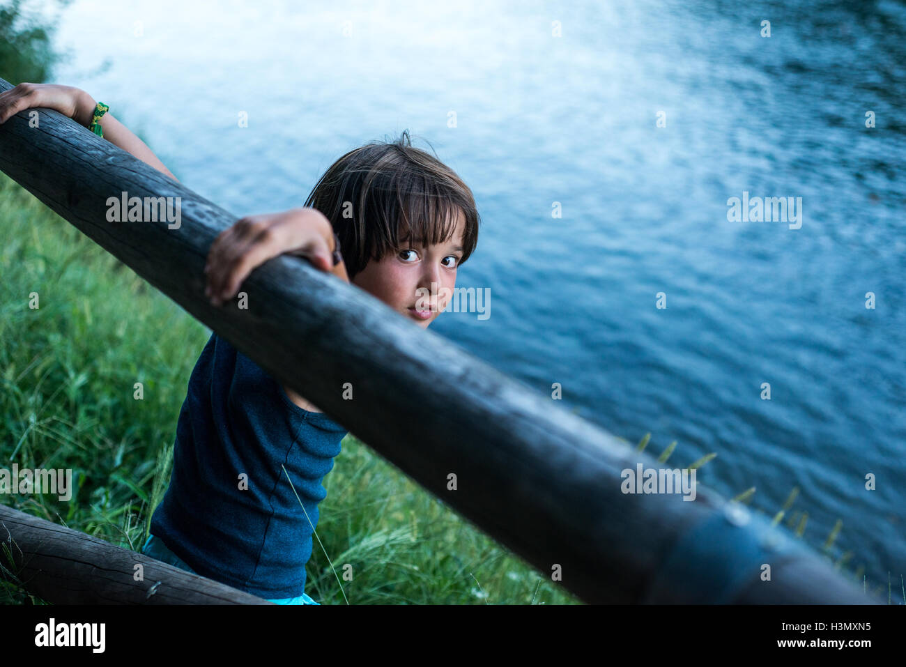 Person looking over fence hi-res stock photography and images - Alamy