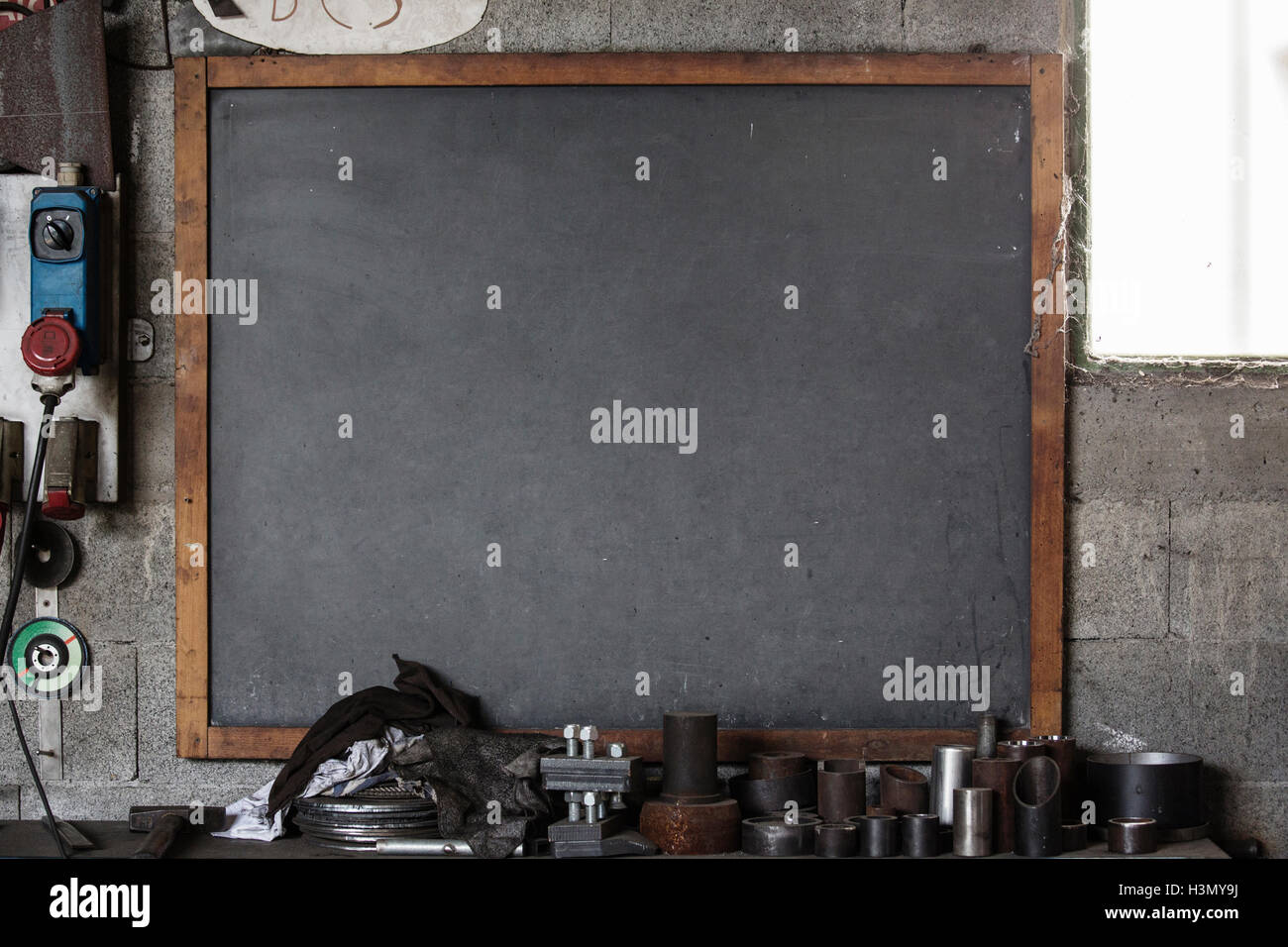 Blackboard, tools and tubes Stock Photo - Alamy