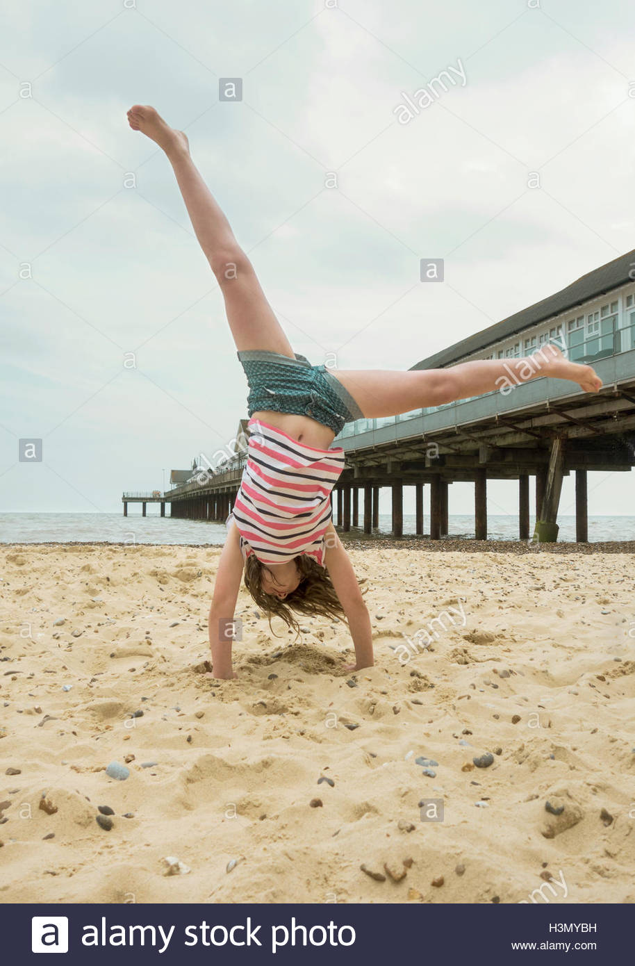 Girl Cartwheeling High Resolution Stock Photography and Images - Alamy