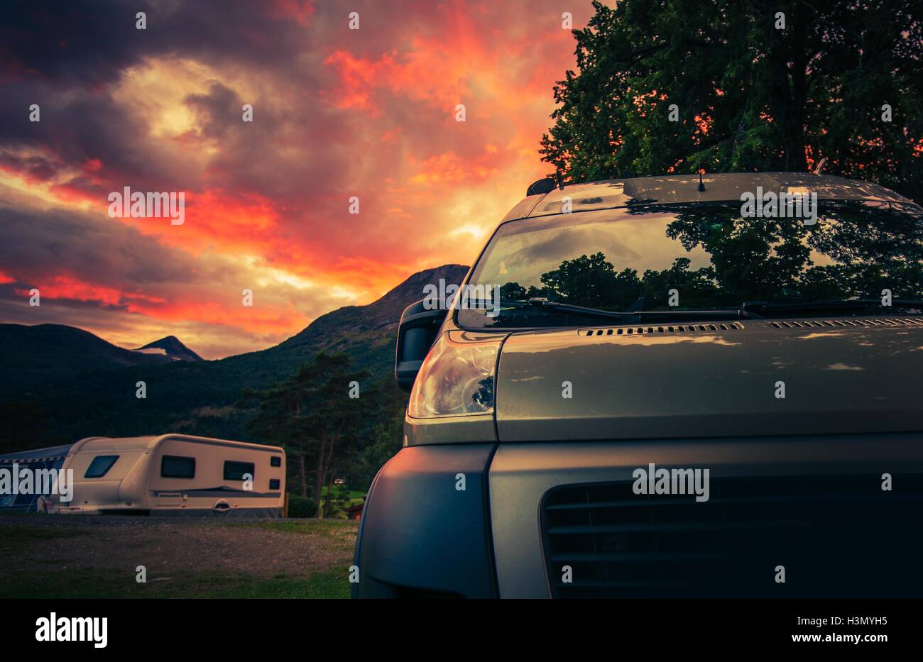 Scenic RV Park Camping During Beautiful Summer Sunset. Motorhome and ...