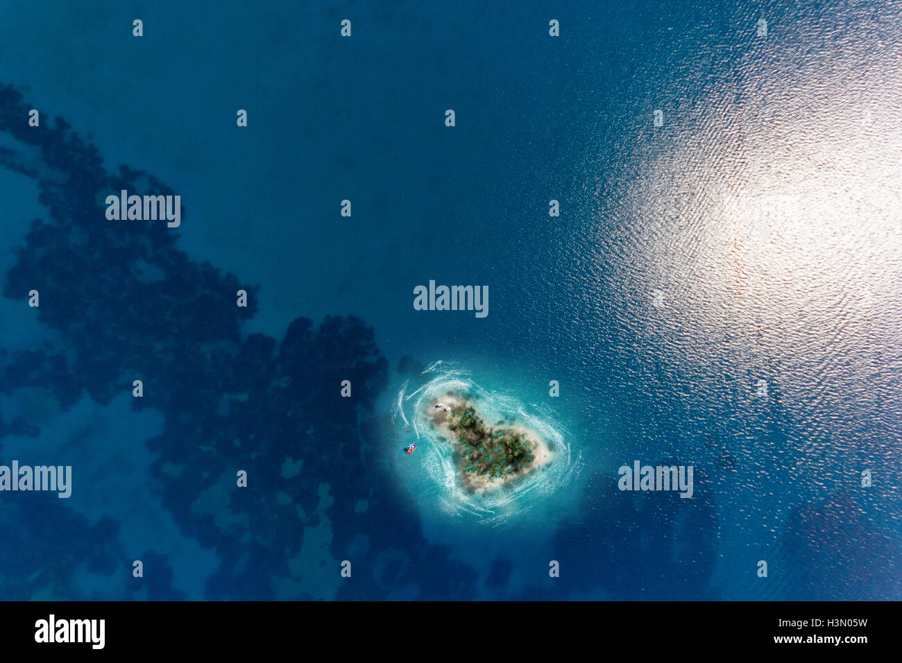 The lost island travel concept - 3D illustration Stock Photo - Alamy