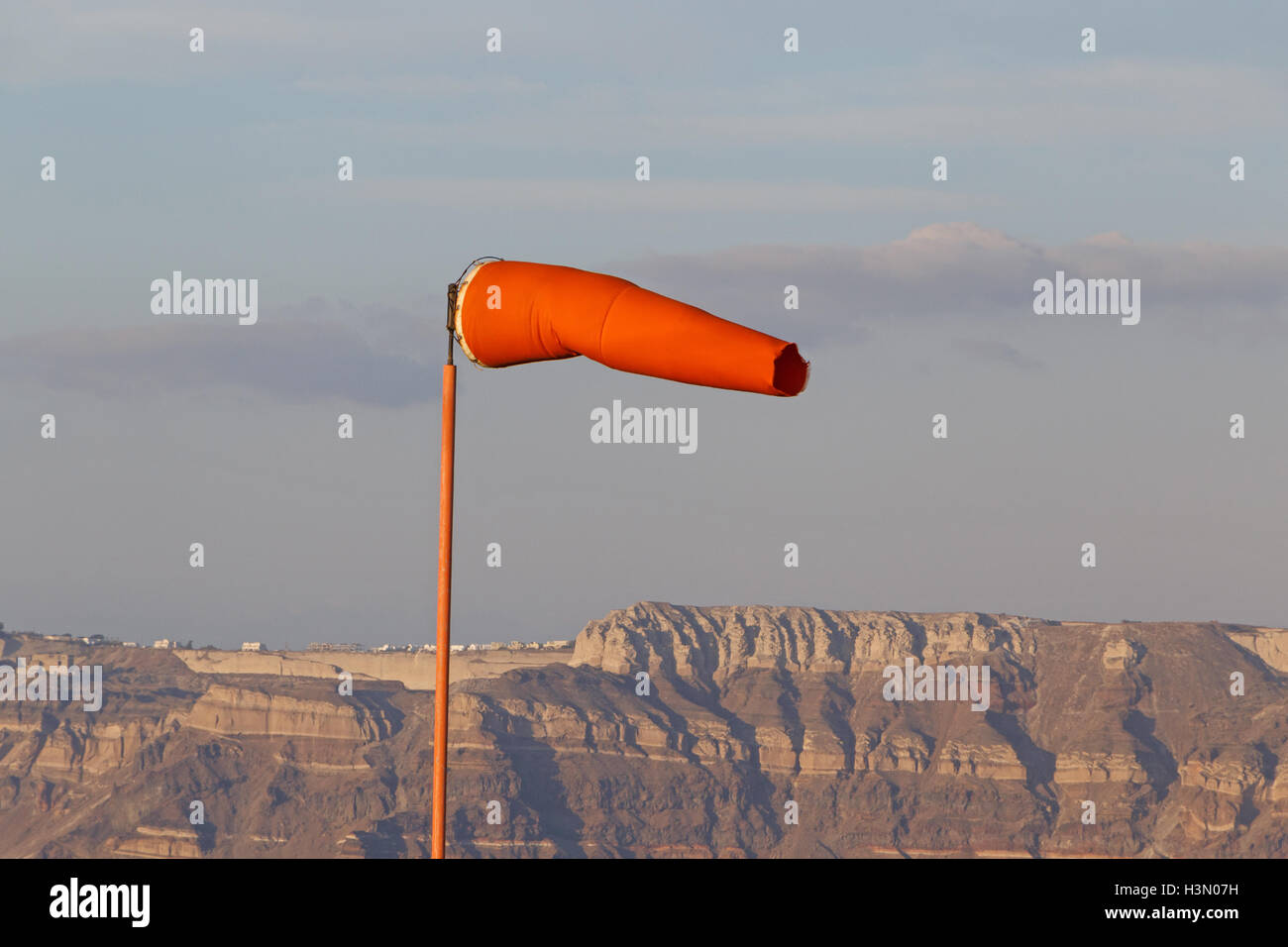 landscape with windsock on Santorini island Stock Photo - Alamy
