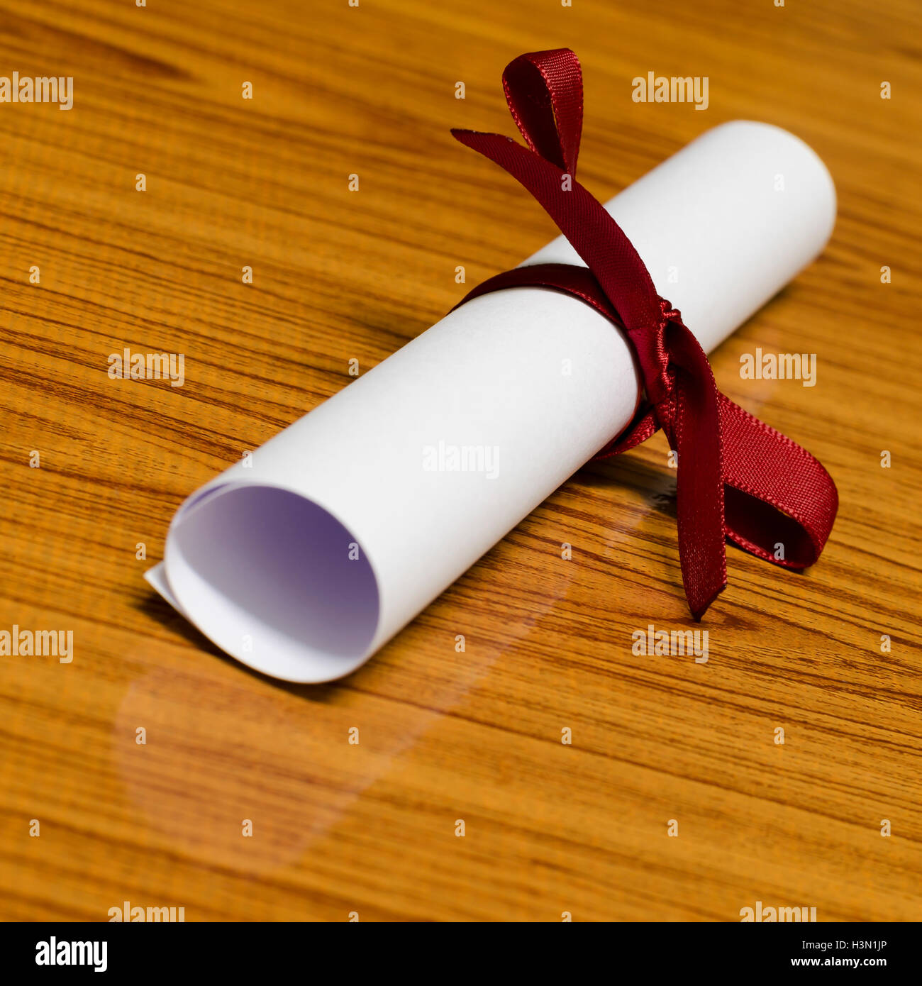 Rolled up certificates hi-res stock photography and images - Alamy