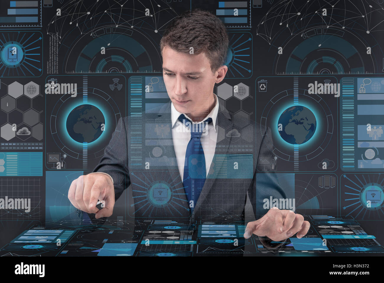 Young man in data management concept Stock Photo - Alamy