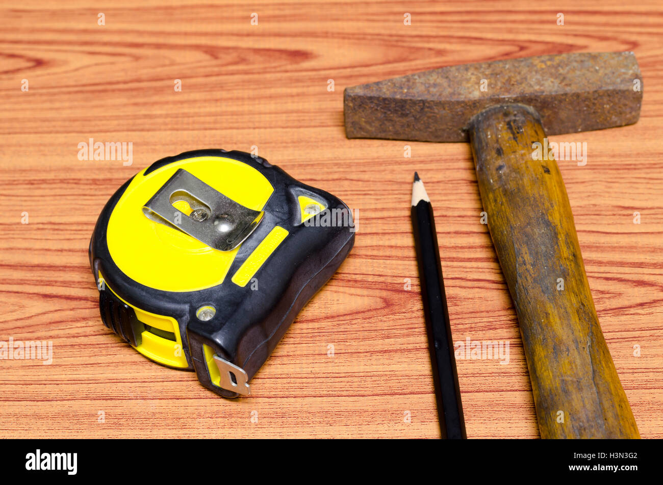 hammer measuring tape and pencil Stock Photo - Alamy