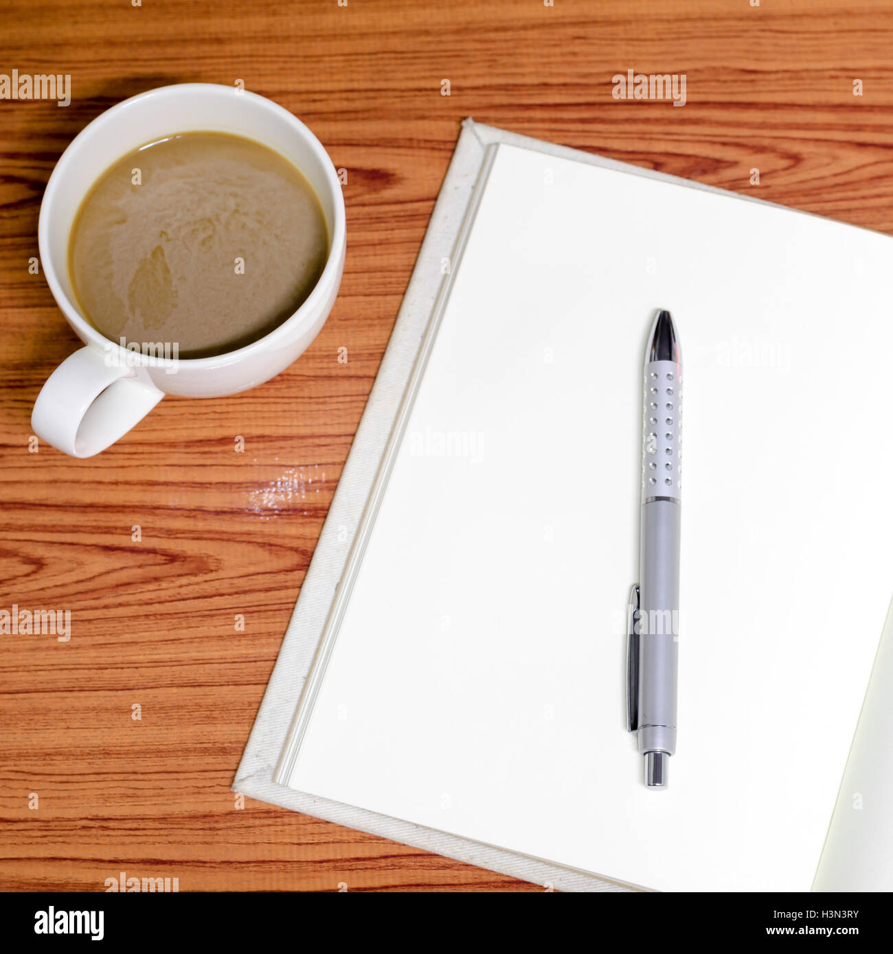 coffee and notebook Stock Photo - Alamy