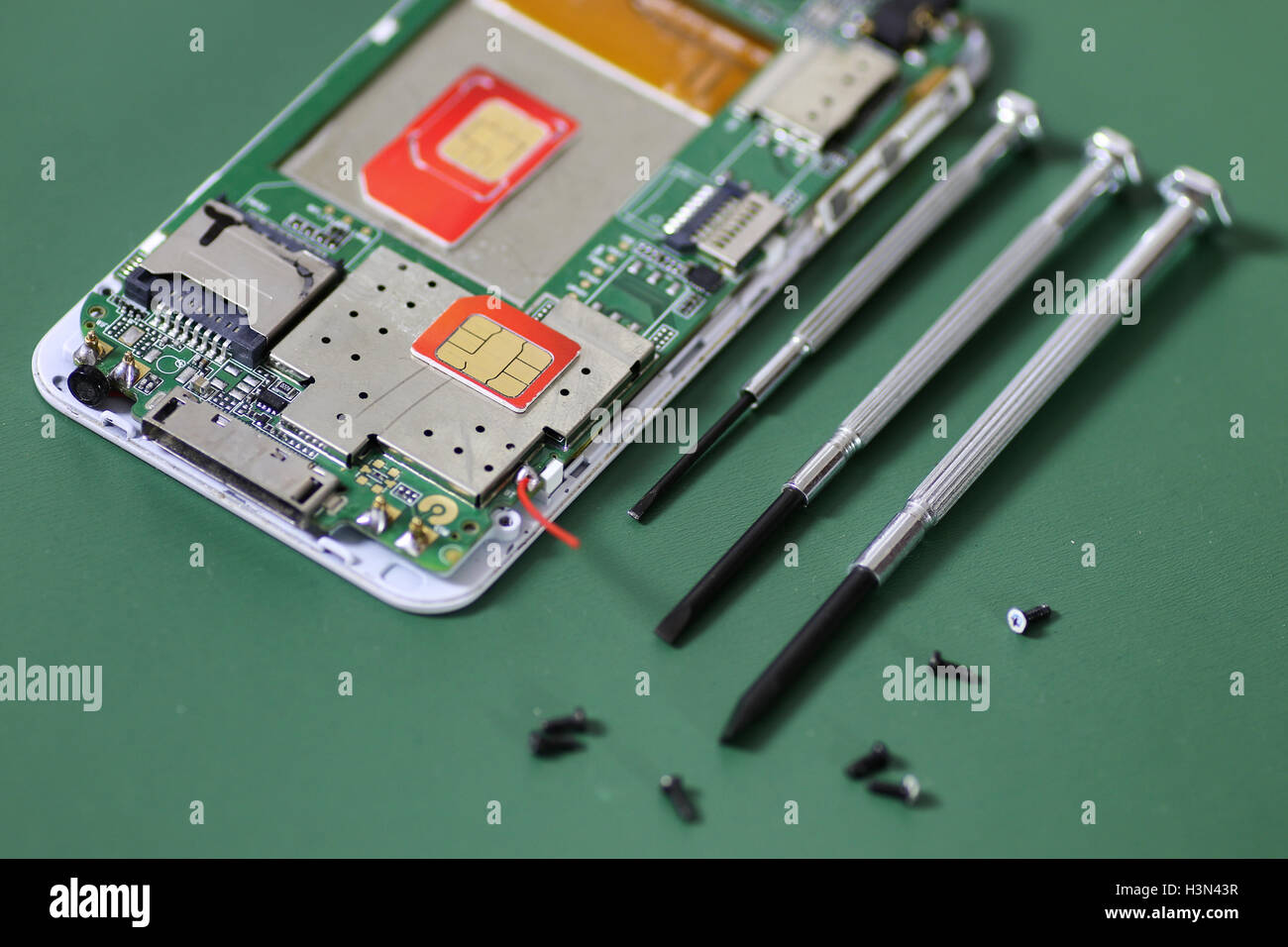 cell phone chip micro repair Stock Photo - Alamy