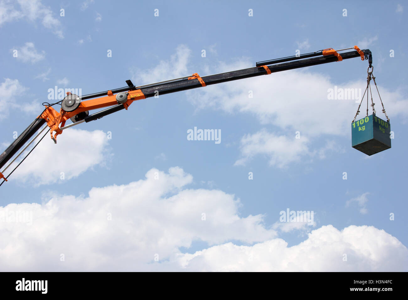 Crane hook and cargo container Stock Photo - Alamy