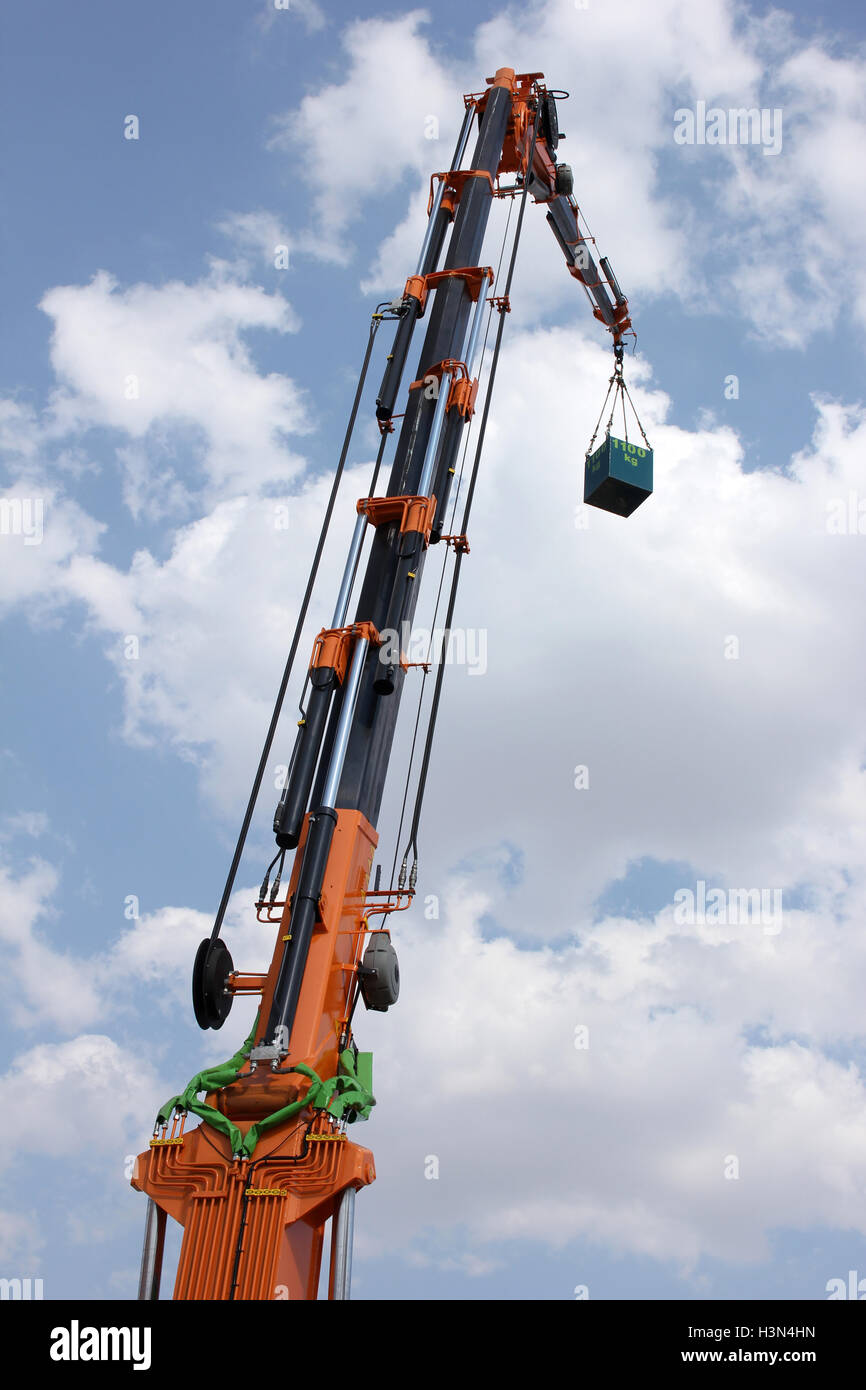 Crane hook and container Stock Photo - Alamy