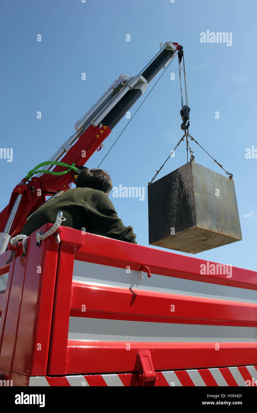 Crane hook and cargo container Stock Photo - Alamy