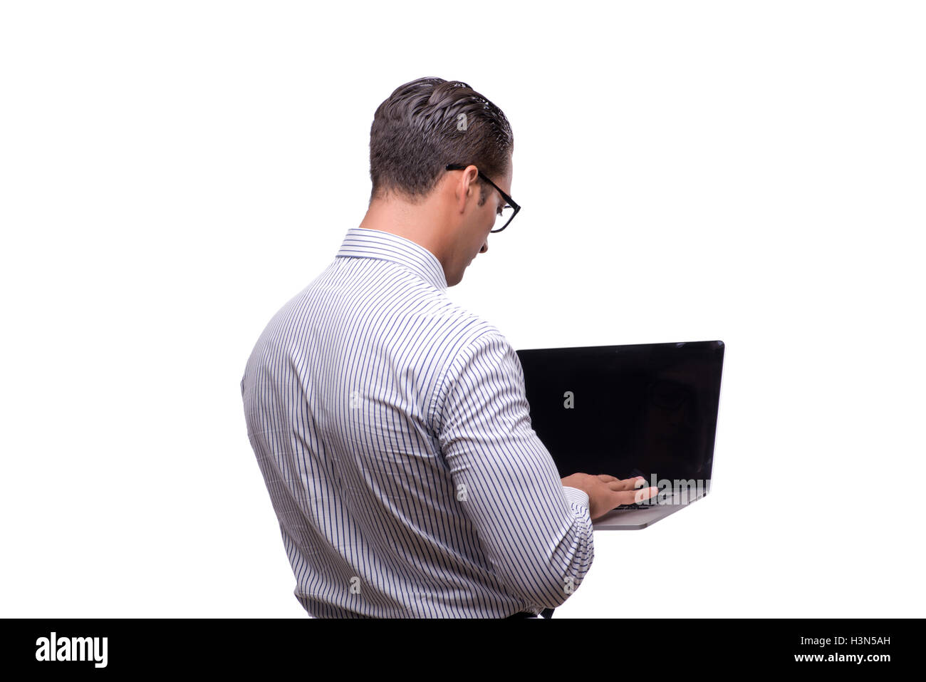 Handsome businessman working with laptop computer isolated on white ...