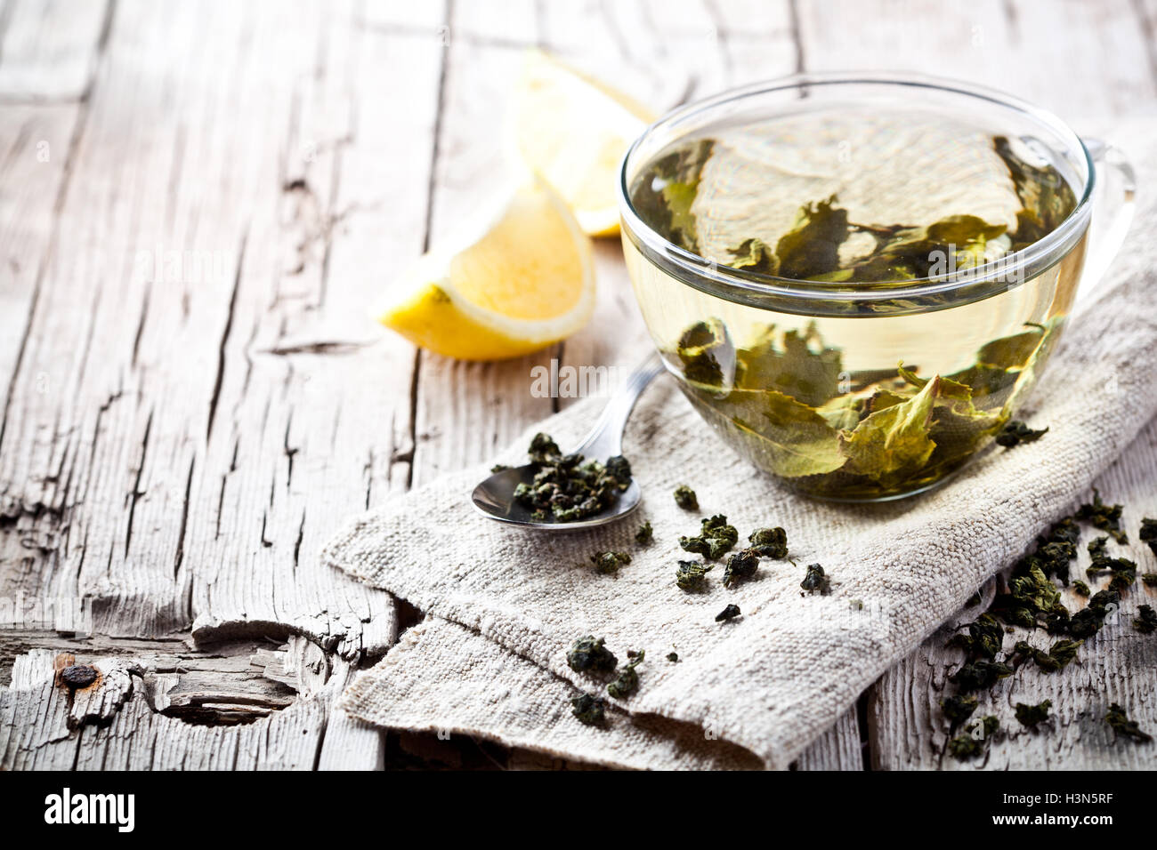 cup of green tea and lemon Stock Photo - Alamy